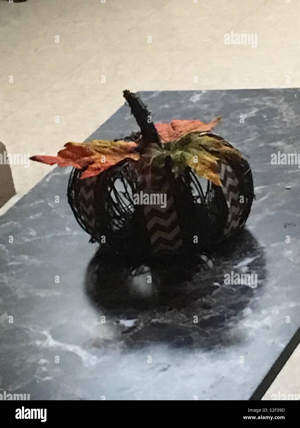 Fall twig pumpkin home decor Stock Photo - Alamy