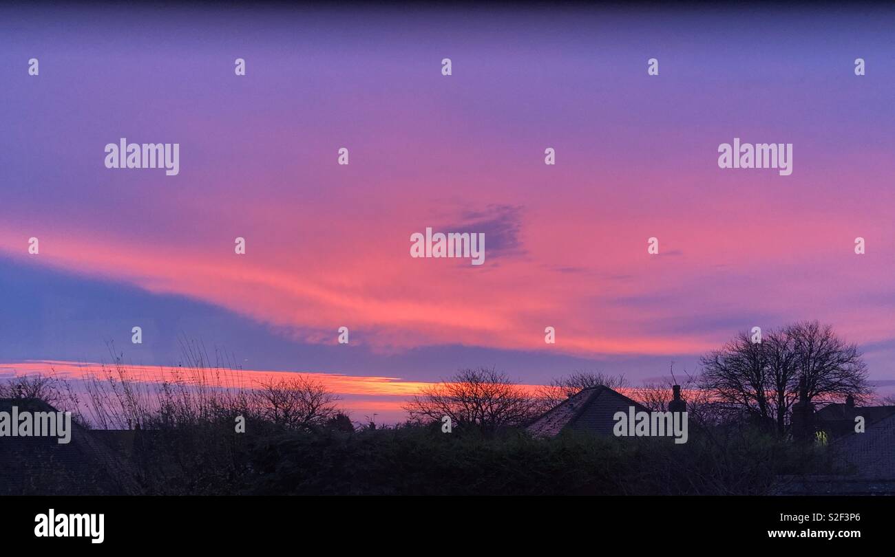 Purple December sunrise - no filter Stock Photo - Alamy