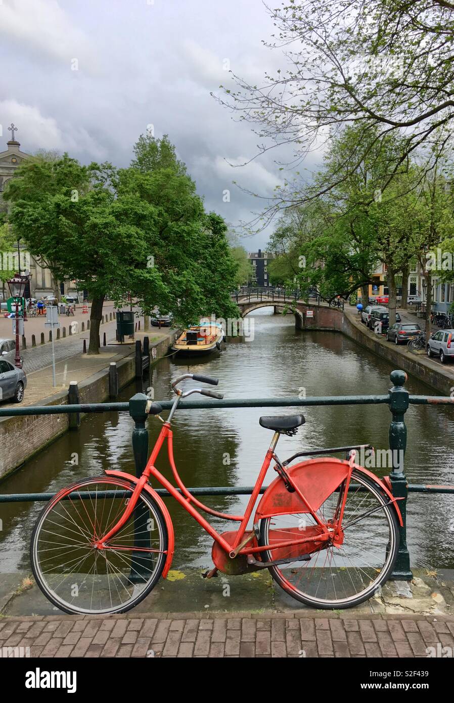 Red Bicycle in Amsterdam Stock Photo - Alamy