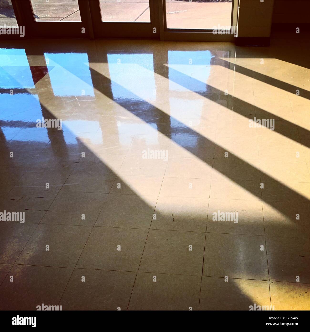 Shadows casted on an interior floor space Stock Photo - Alamy