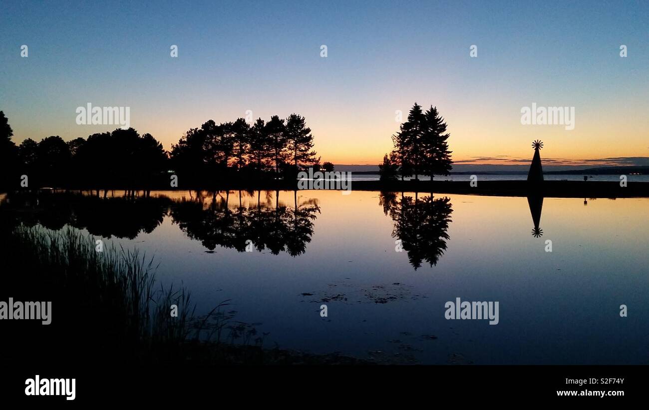 Sunset Reflection on the lake Stock Photo - Alamy