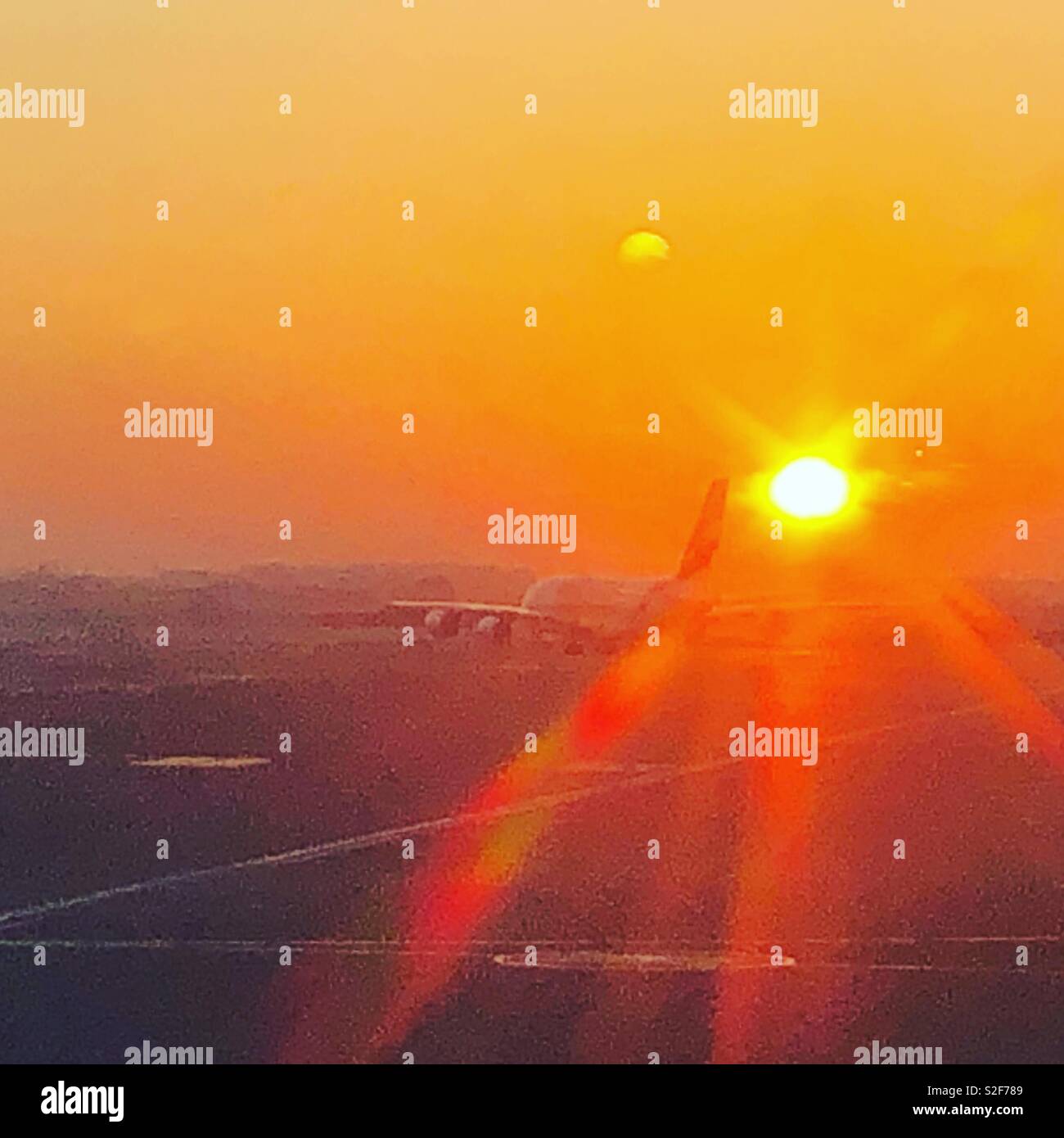 The sun rises, the moon sets and another plane lands at Dubai ...