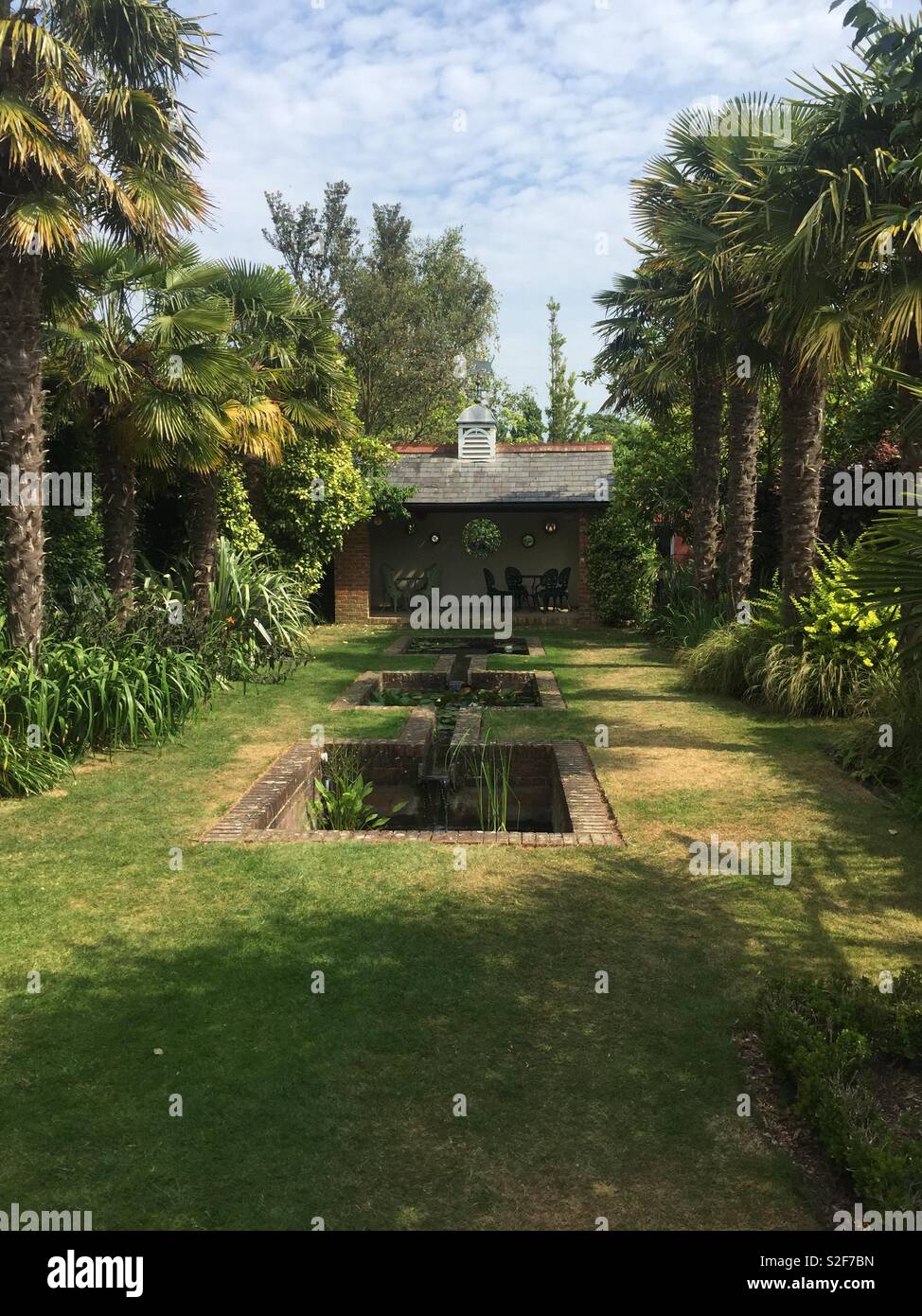 Apple Court Garden lily ponds Stock Photo - Alamy