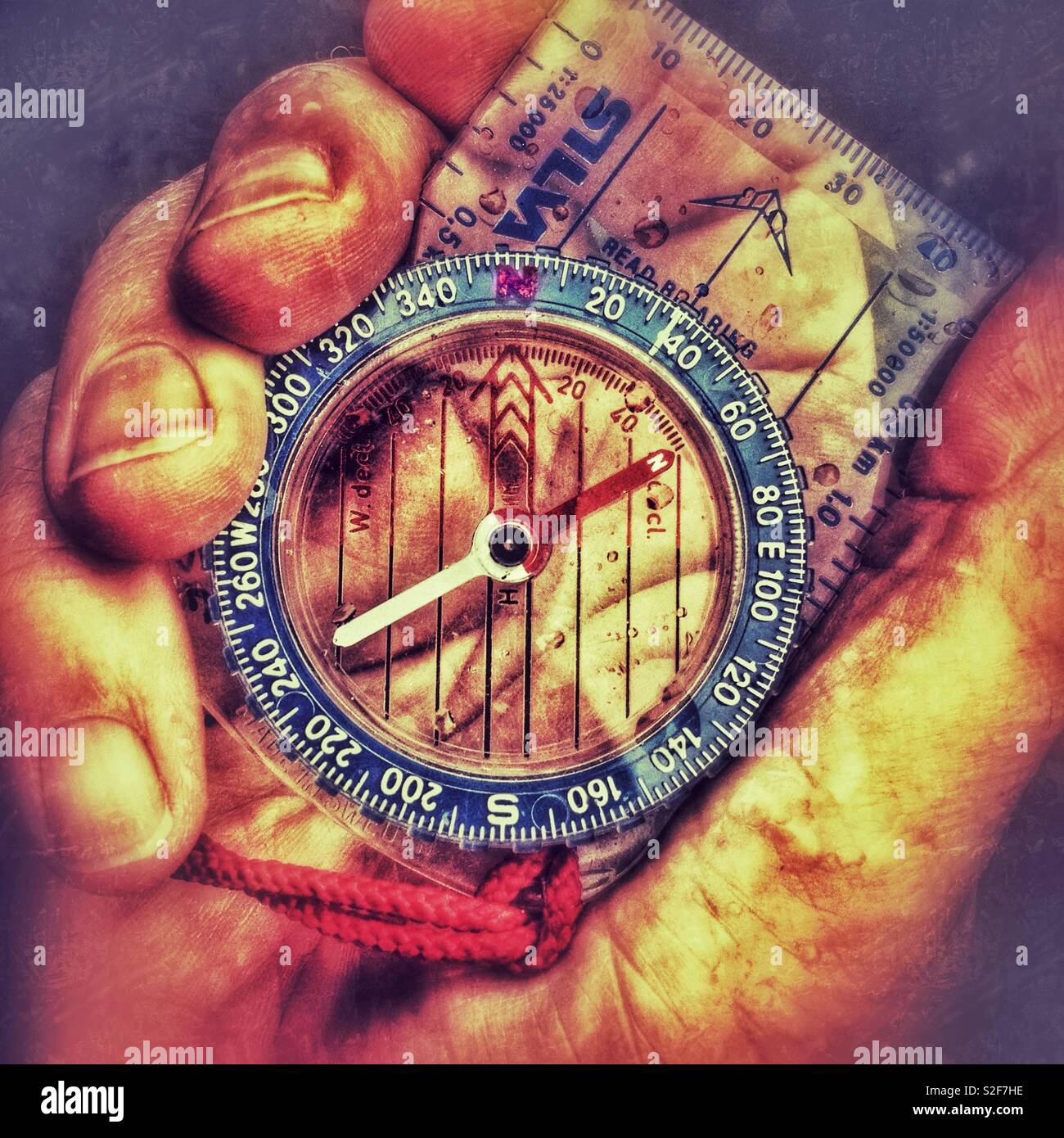 Orienteering using a hand held protractor compass Stock Photo - Alamy