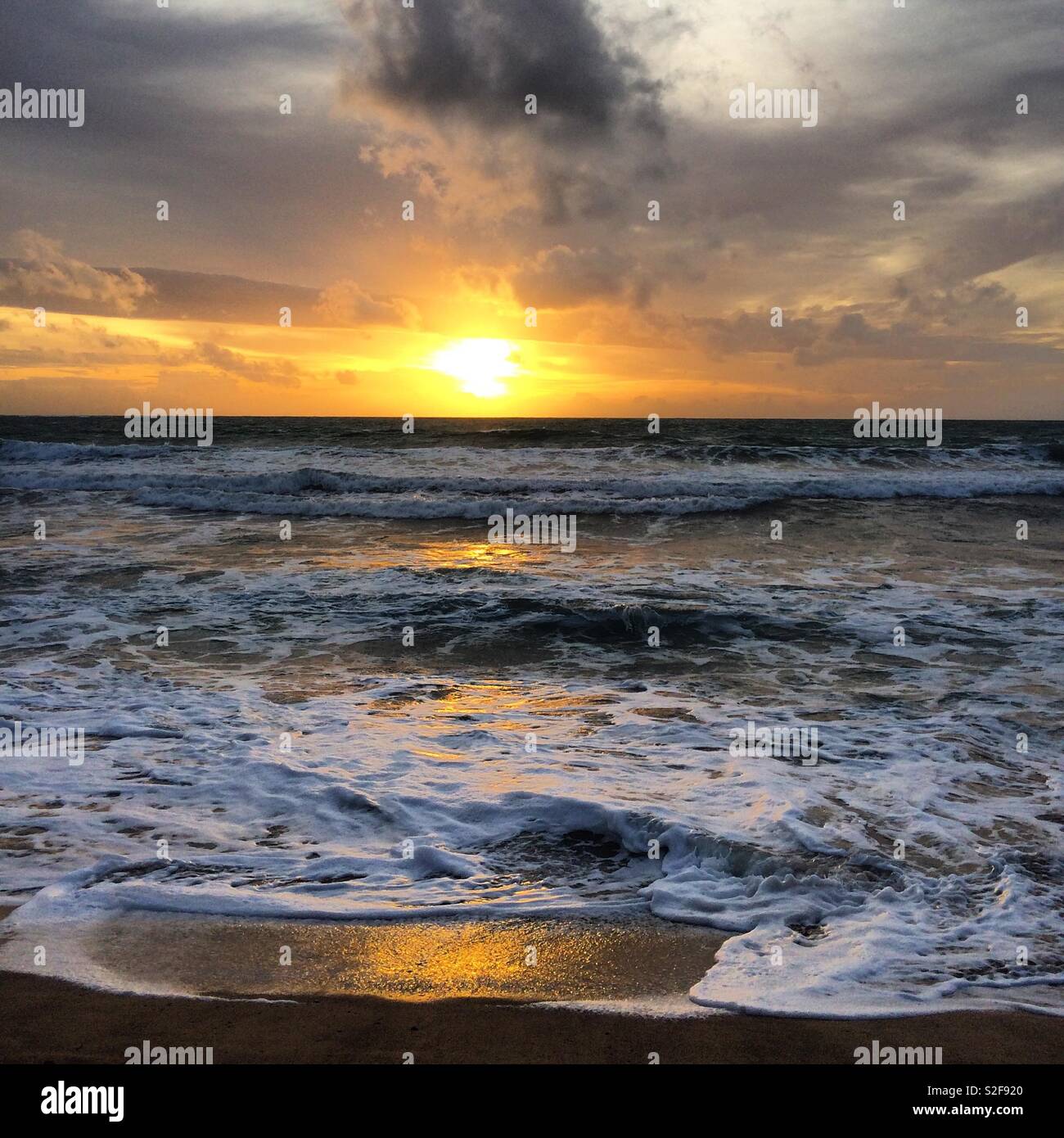 Sunset waves, Bali Stock Photo - Alamy