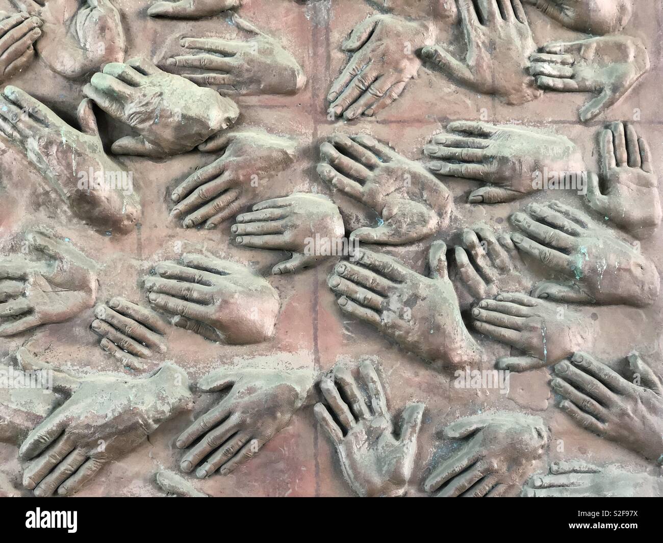 Artistic bronze hands Stock Photo - Alamy