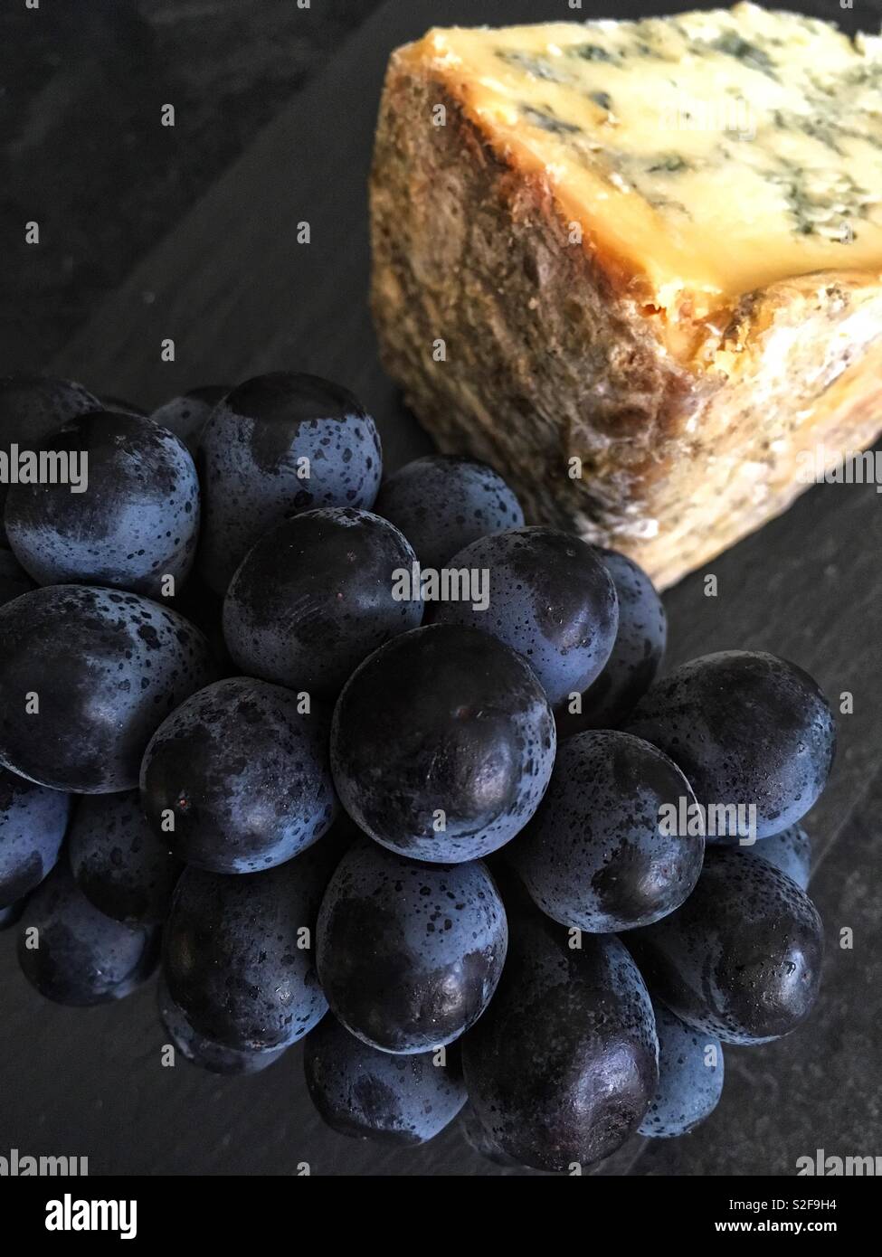 Beautiful grapes and Stilton Stock Photo - Alamy