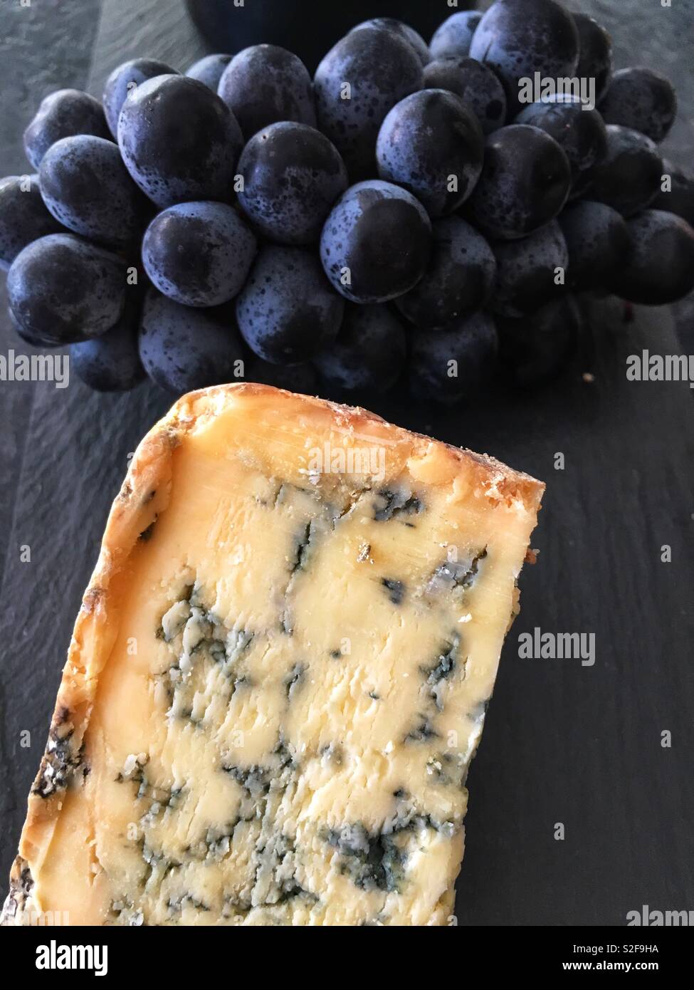 Stilton and grapes Stock Photo - Alamy