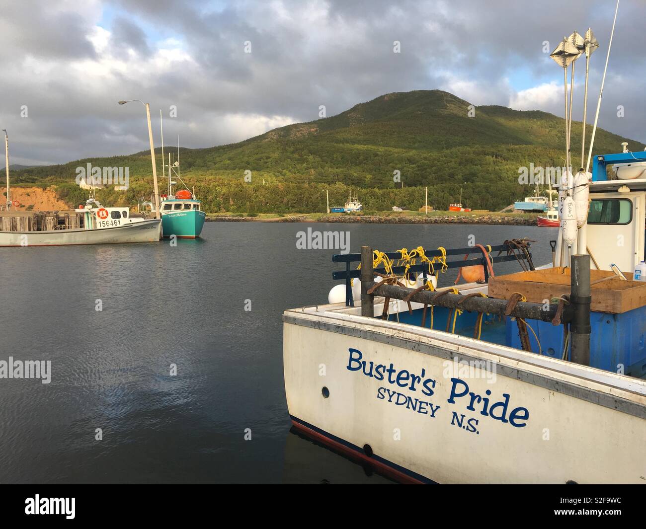 Fishing boats in Pleasant Bay Cape Breton Island Canada Stock Photo - Alamy