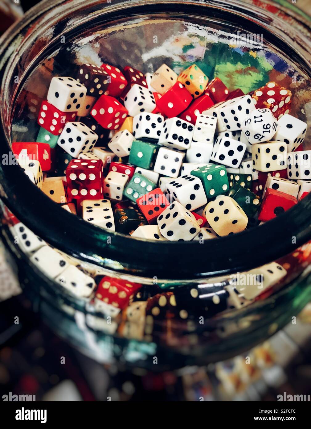 Open big mouth vintage jar full of dice cubes Stock Photo - Alamy