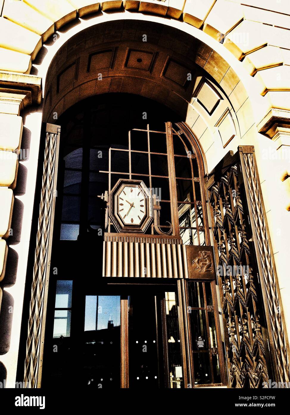Cool octagonal Art Deco clock and metalwork at the entrance to Unilever ...