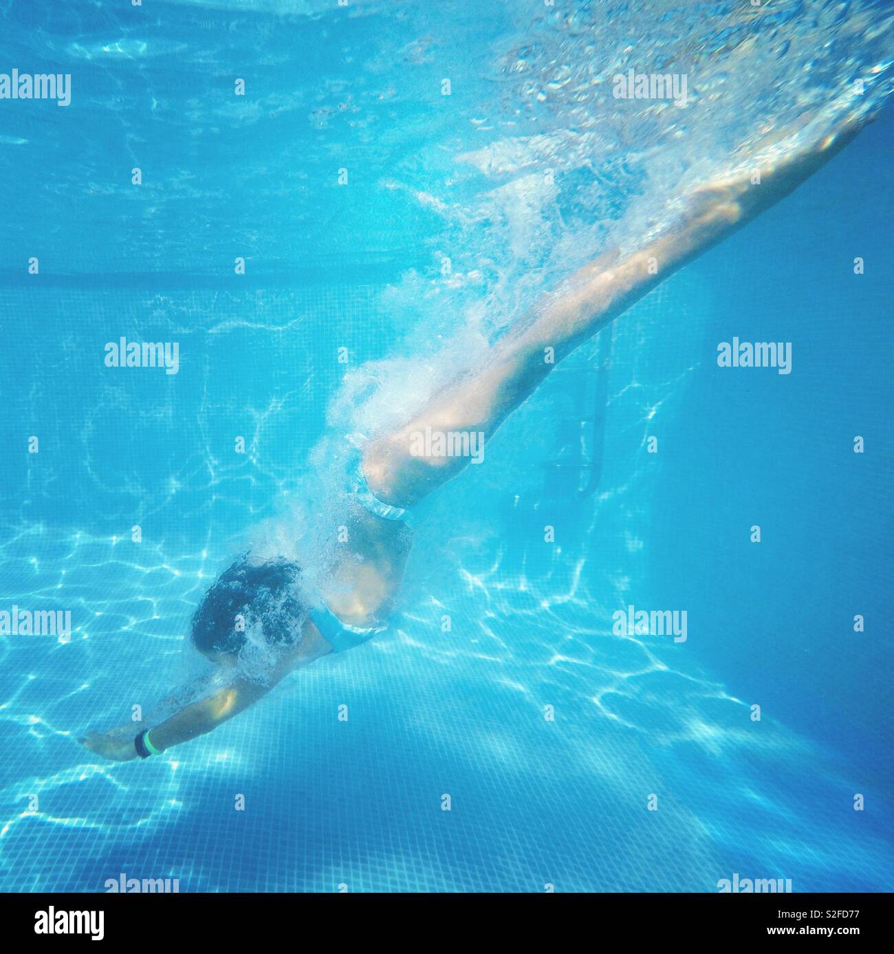 Girl diving into the pool Stock Photo - Alamy