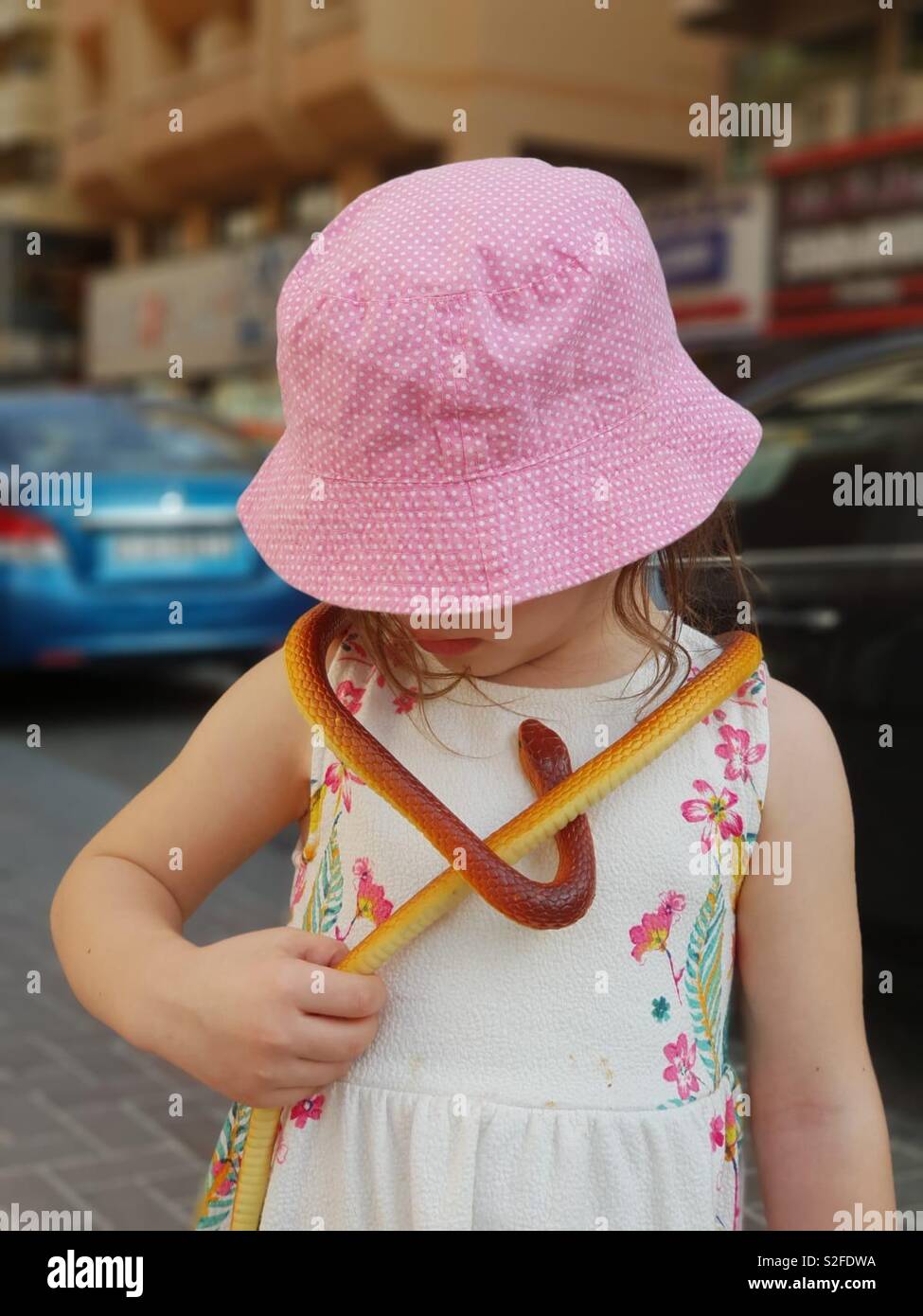 Snake wrapping around shoulders hi-res stock photography and images - Alamy