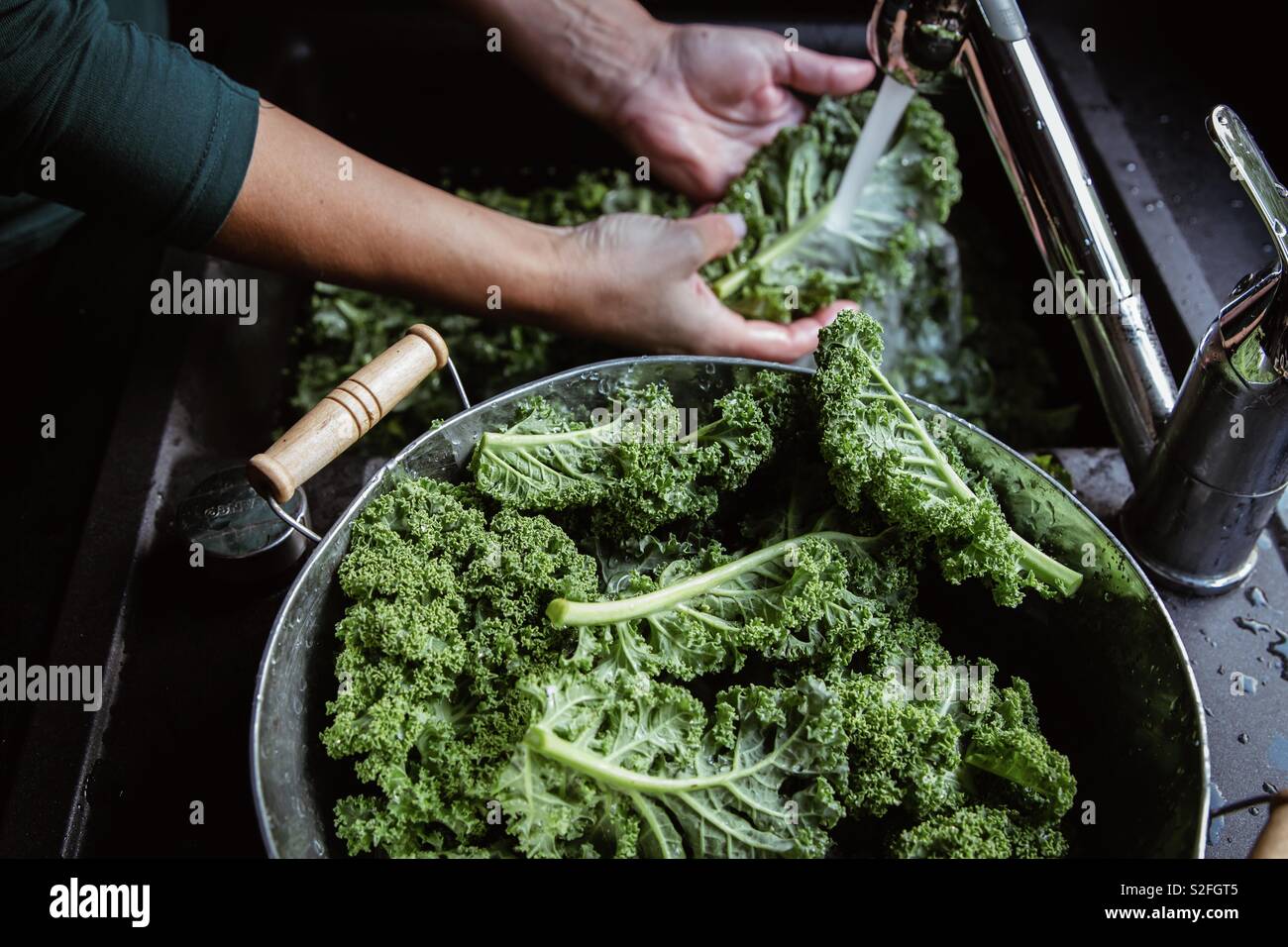 Washing vegetables with tap water hi-res stock photography and images ...