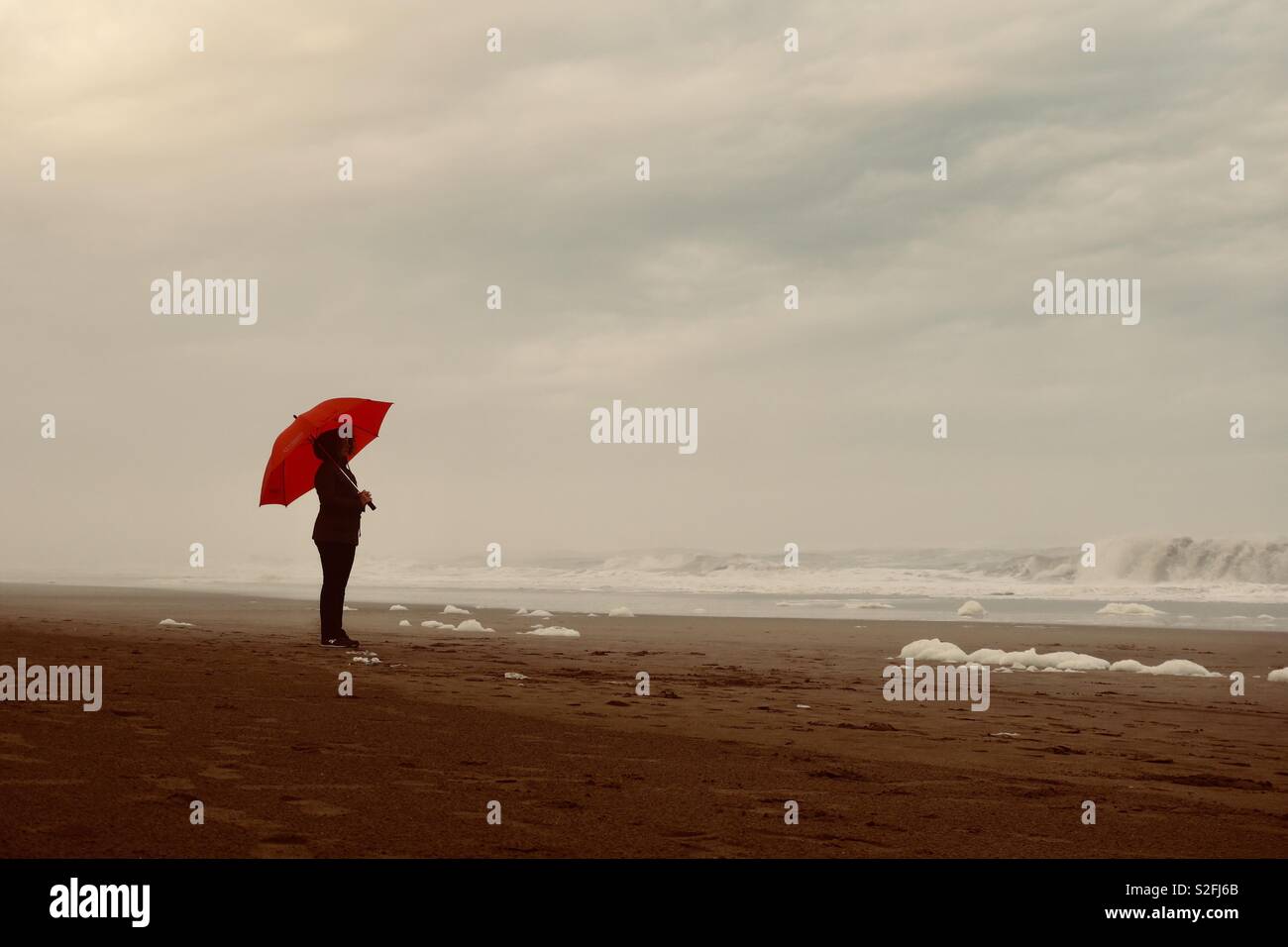 Rain umbrella on beach hi-res stock photography and images - Alamy