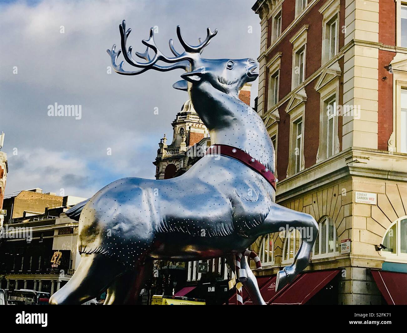 Reindeer statue, Christmas celebrations and decorations in Covent ...