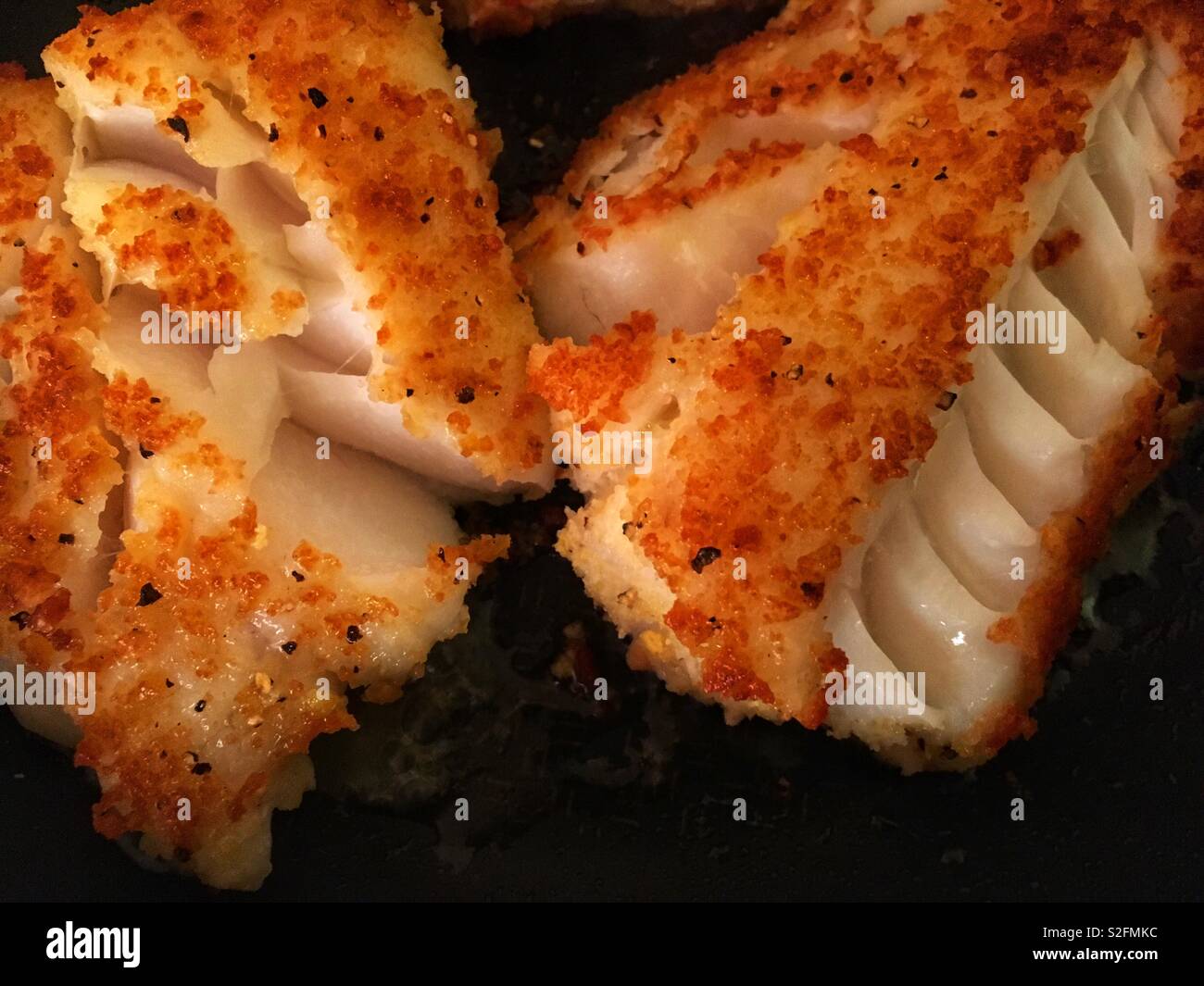 Fresh North Sea cod lightly fried Stock Photo - Alamy