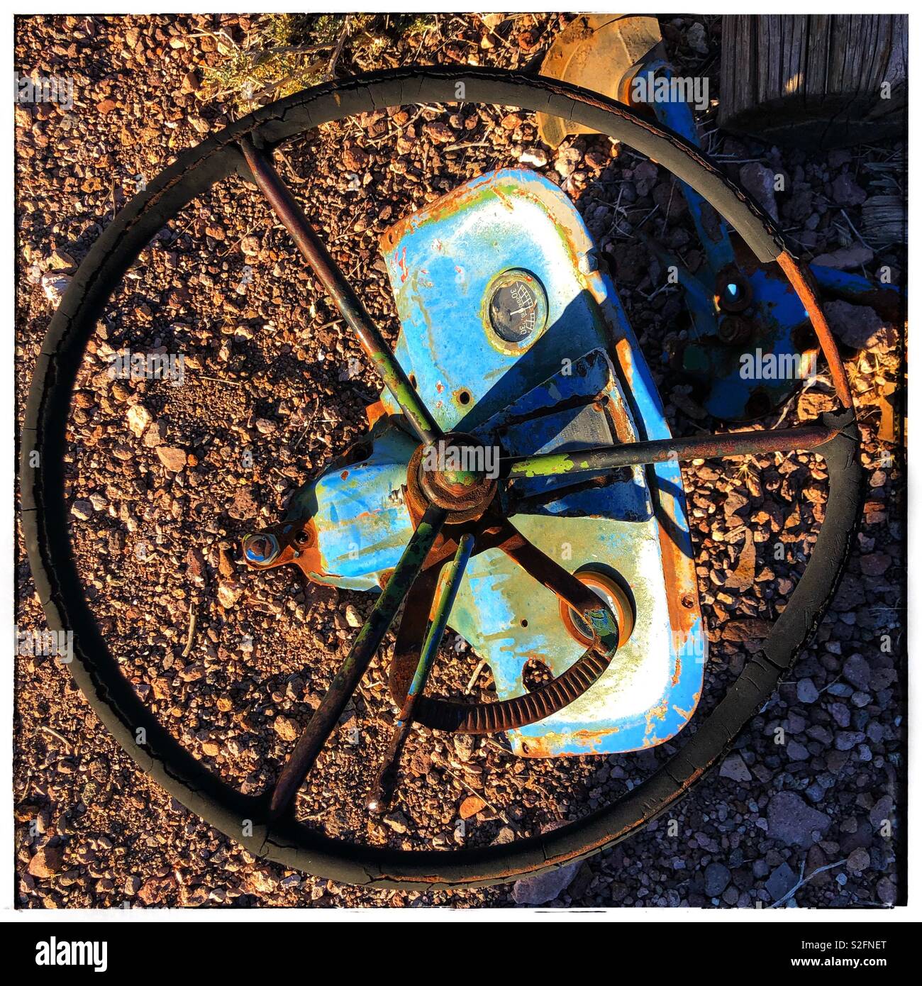 Old rusted wheel in the desert Stock Photo - Alamy