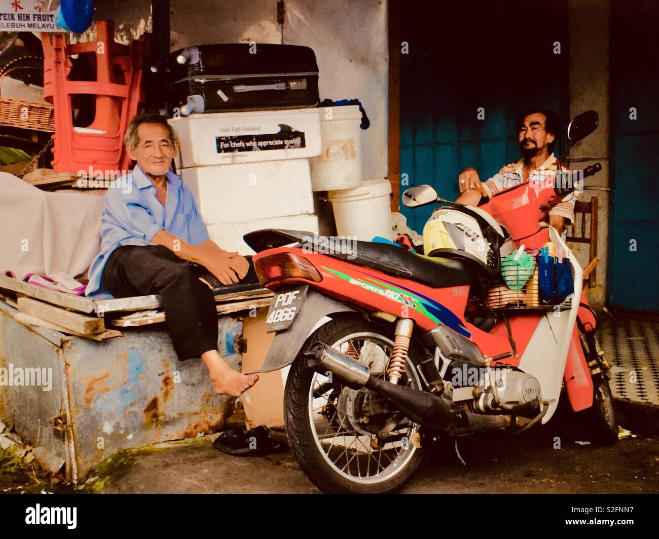 Local men in Penang, Malaysia Stock Photo - Alamy