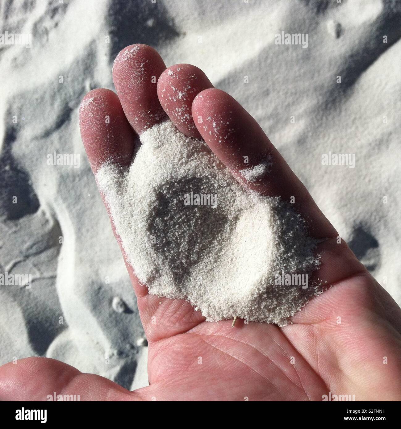 Handful of sand hi-res stock photography and images - Alamy