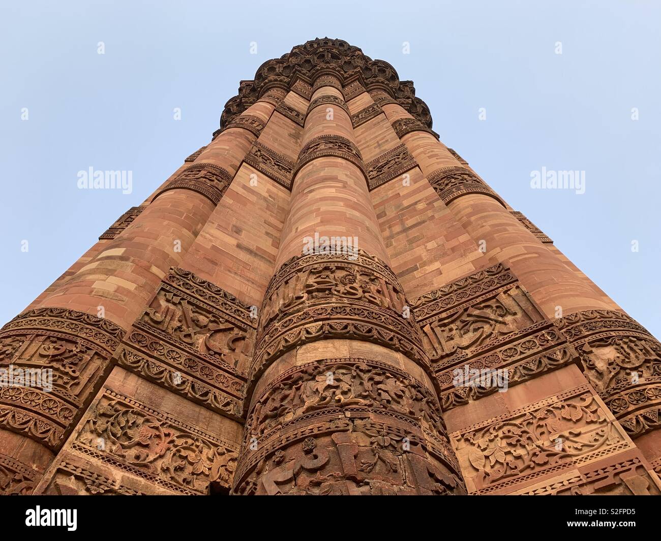 View from the base of the Qutab Minar in the Qutab complex in Delhi ...