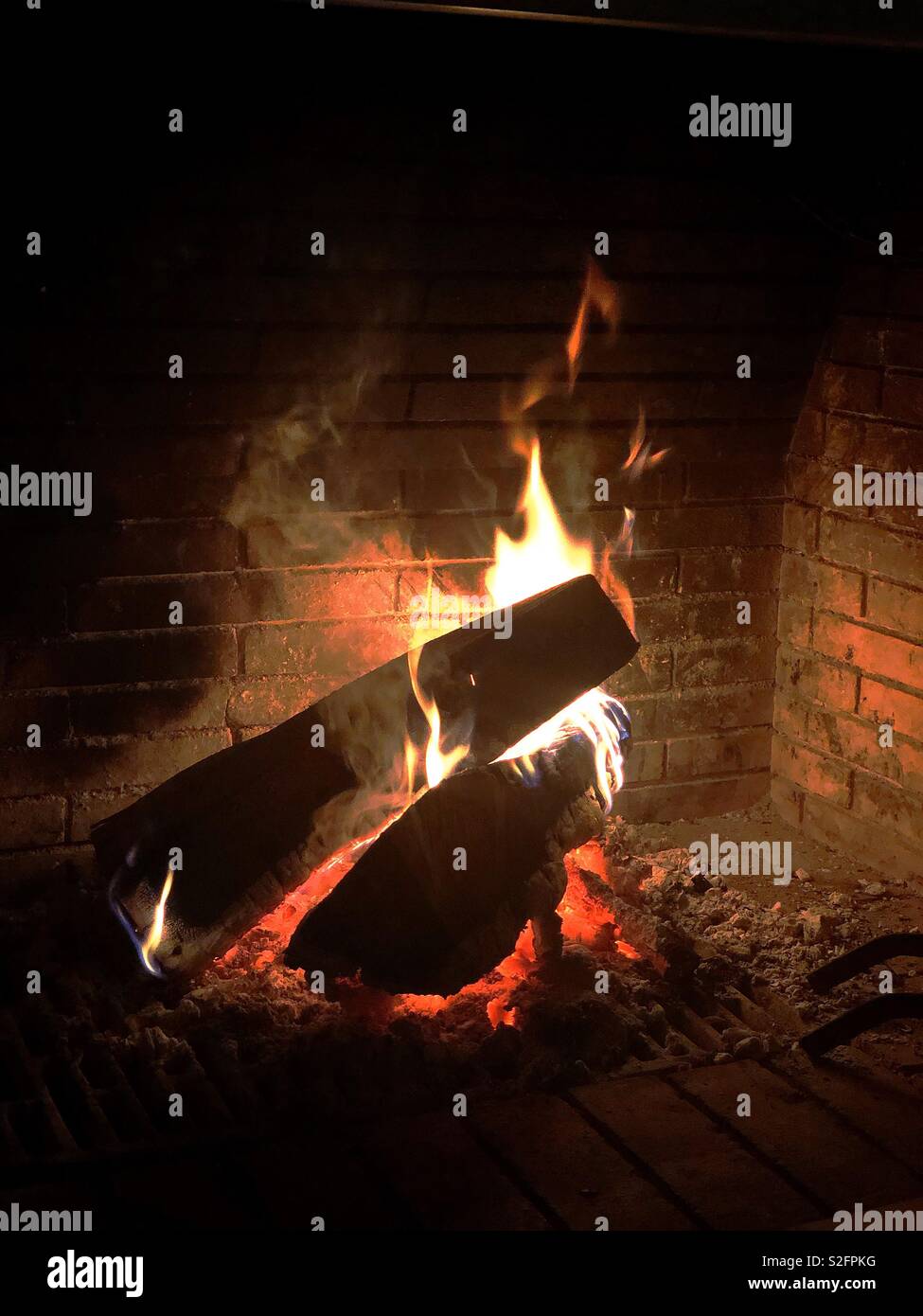 Fireplace close up, firewood flames Stock Photo - Alamy