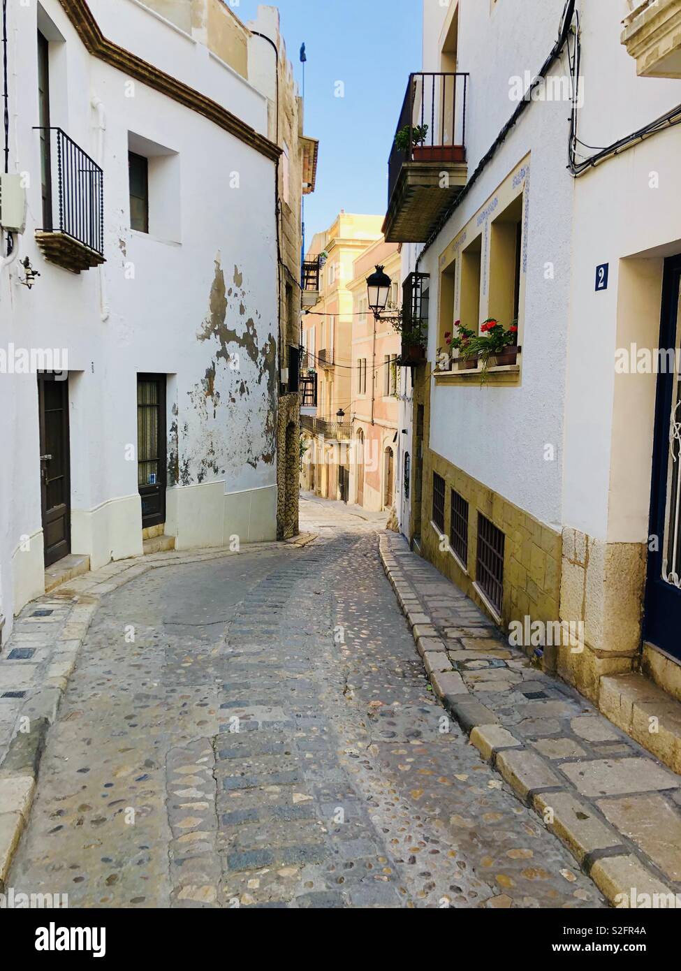 A street in historic part of Sitges Stock Photo - Alamy