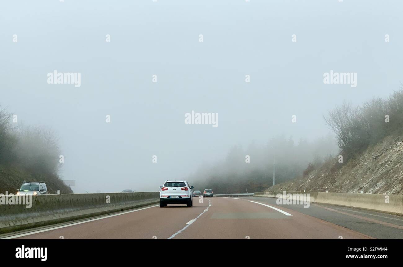 Driving the fog hi-res stock photography and images - Alamy