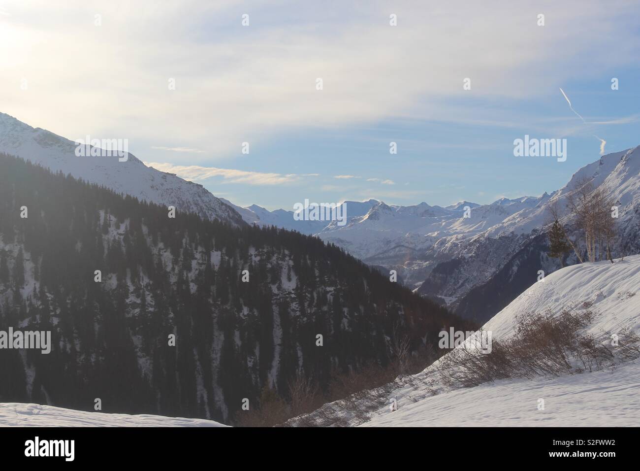 Over the snowy tops Stock Photo - Alamy