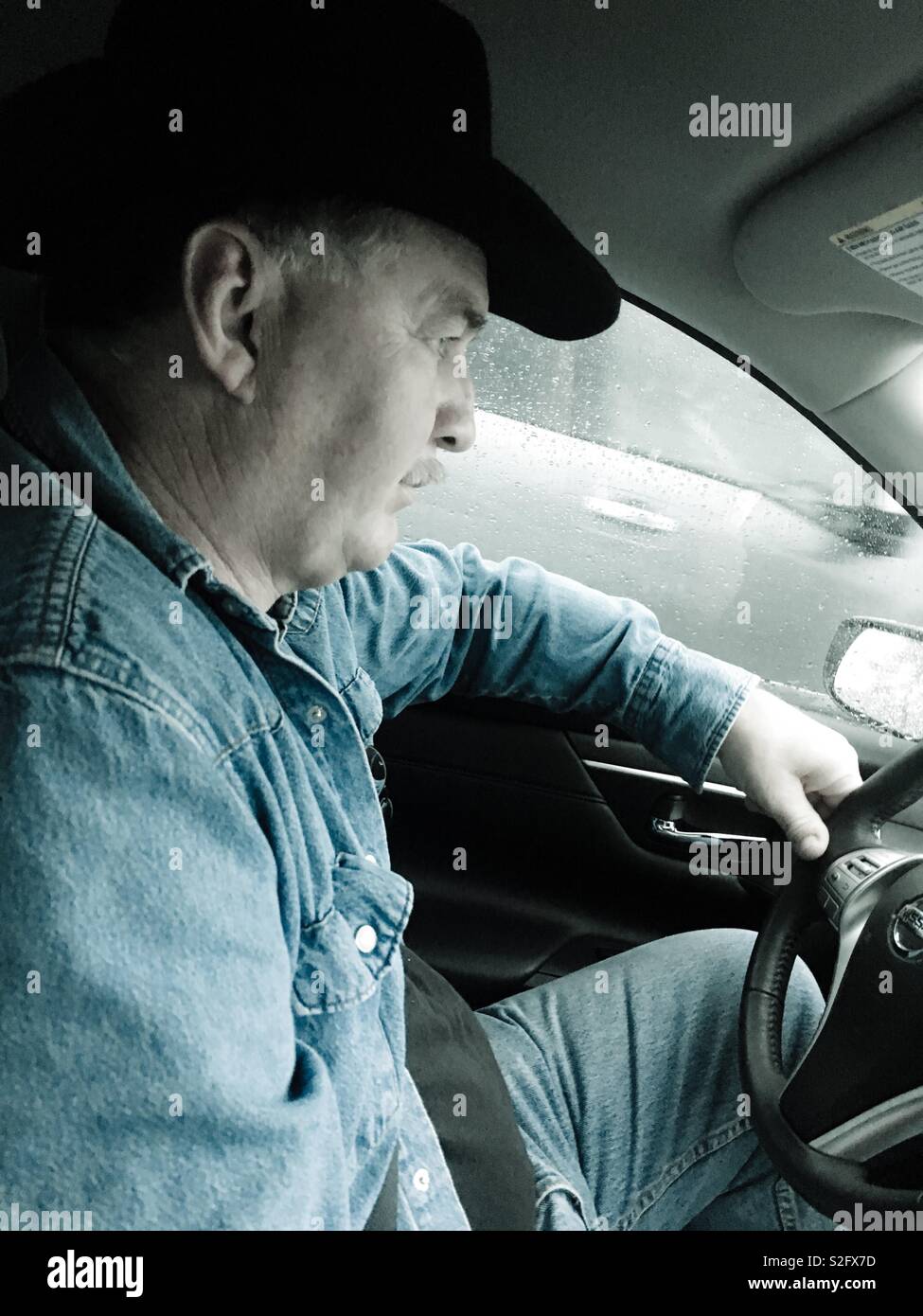 Country boy driving car Stock Photo - Alamy