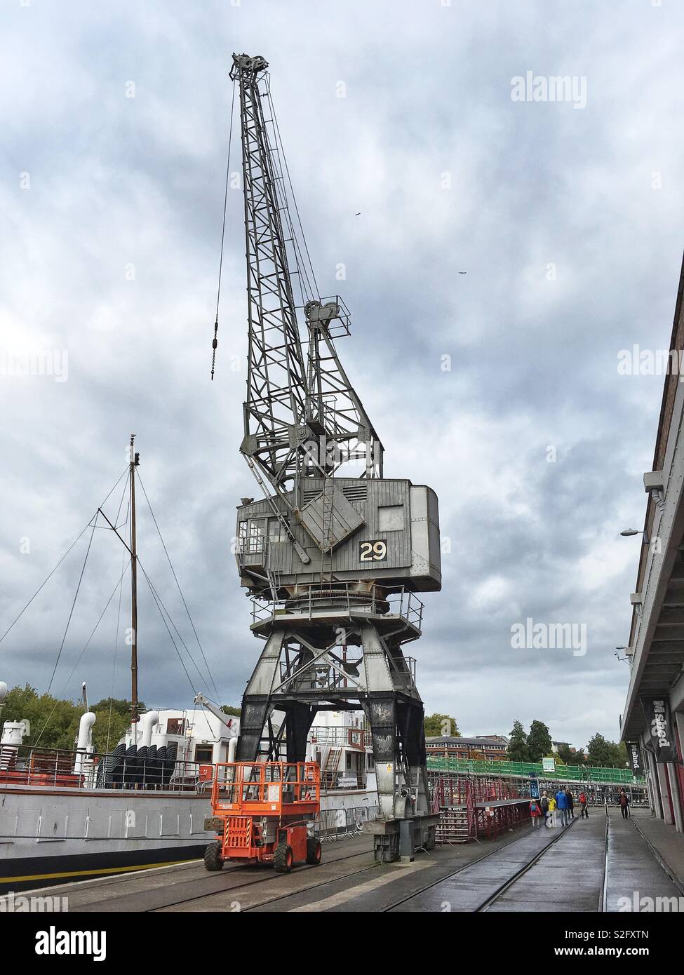 A preserved dockside crane outside the M Shed museum in Bristol, UK ...