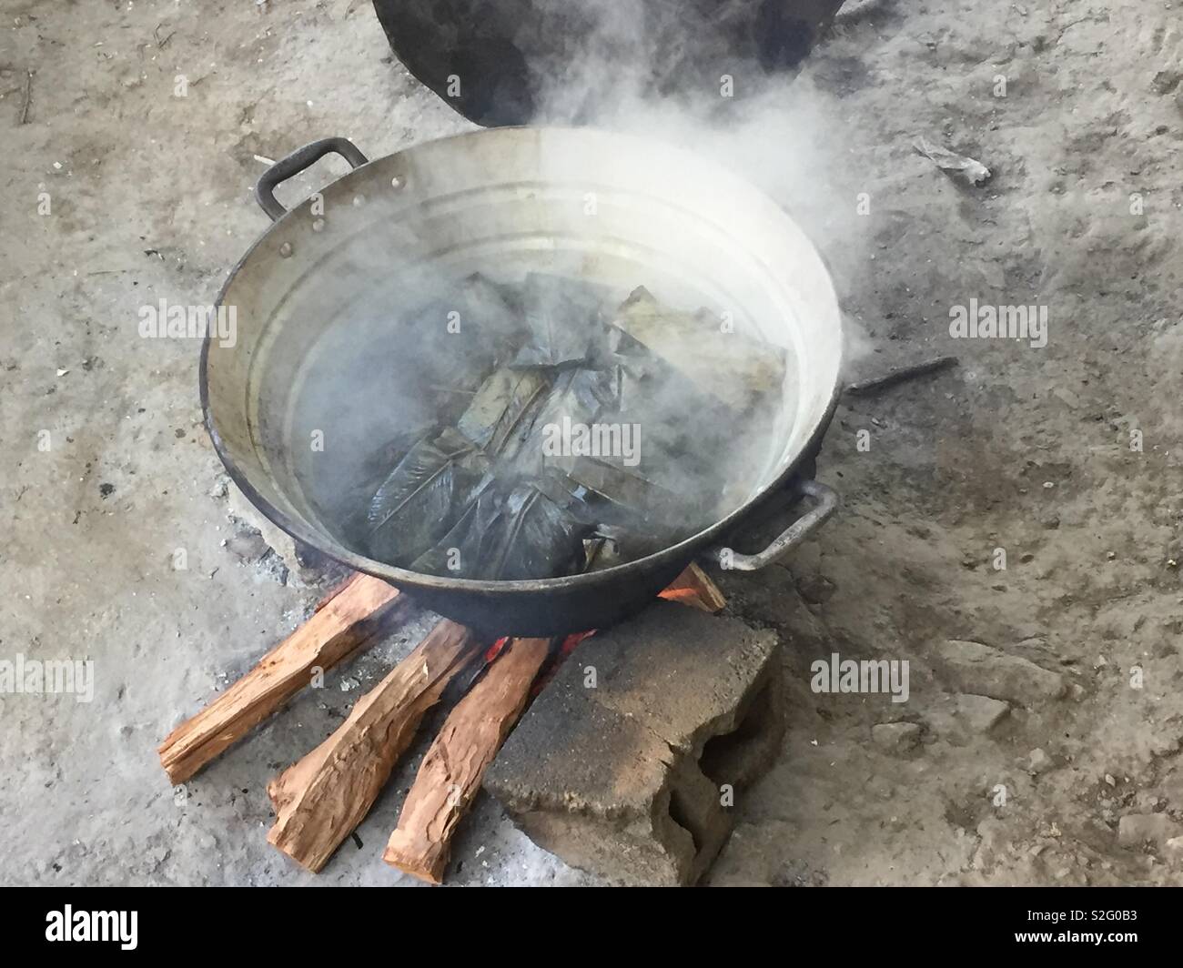 Tamales being reheated Stock Photo - Alamy