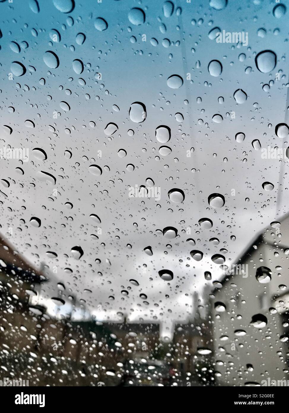 Rain on window Stock Photo - Alamy