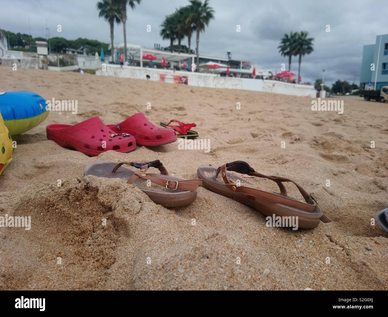 shoes on the beach Stock Photo - Alamy