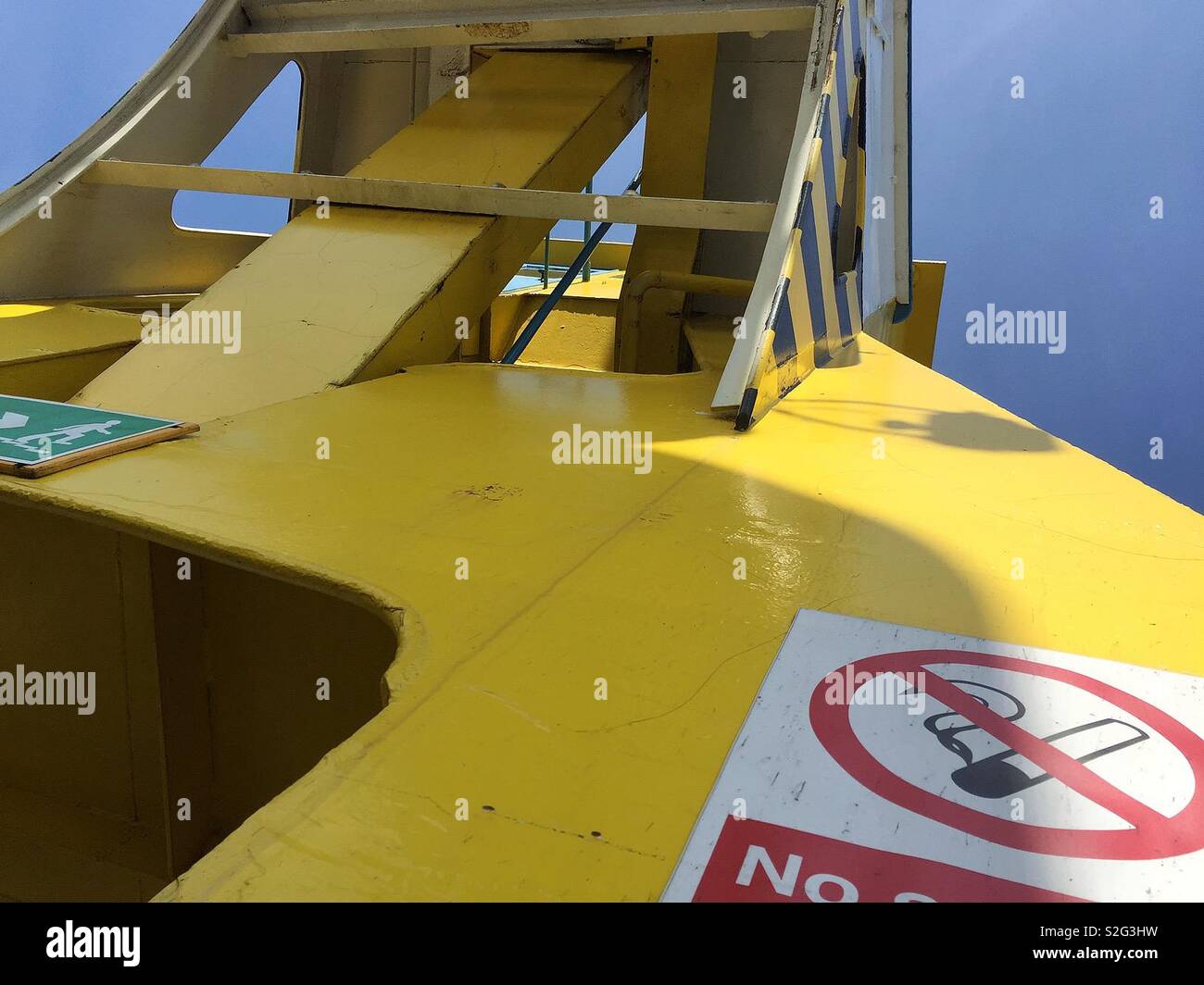 Giant yellow metal structure in the sunshine Stock Photo - Alamy