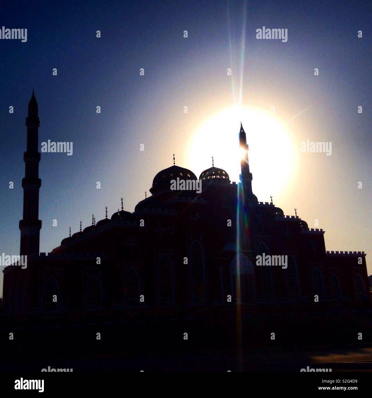 Dubai mosque at sunrise Stock Photo - Alamy