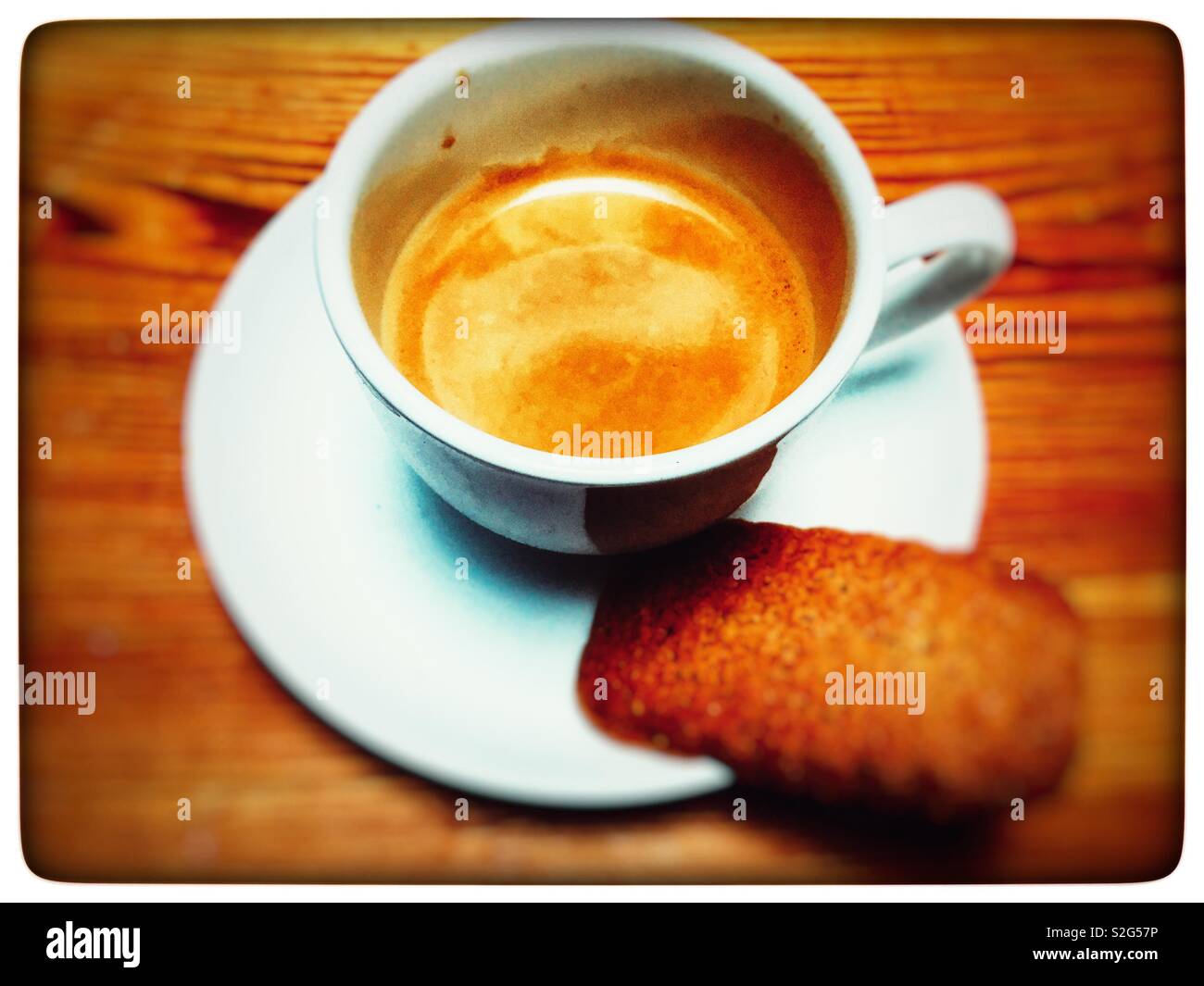 Espresso coffee with biscuit Stock Photo - Alamy