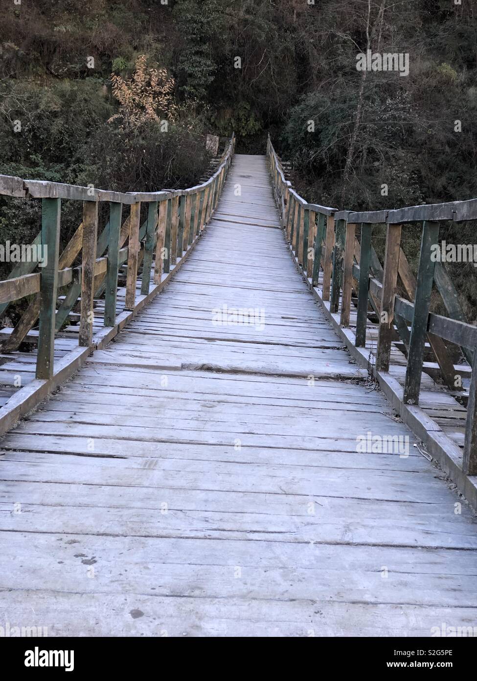 Build a bridge by extending your hand Stock Photo - Alamy