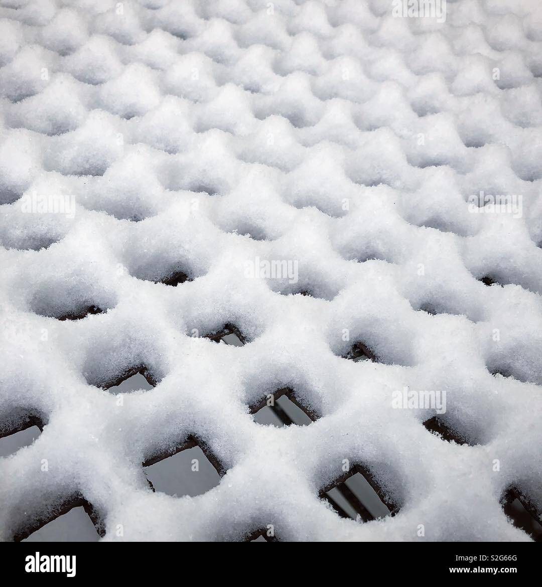 Lattice table covered in snow Stock Photo - Alamy