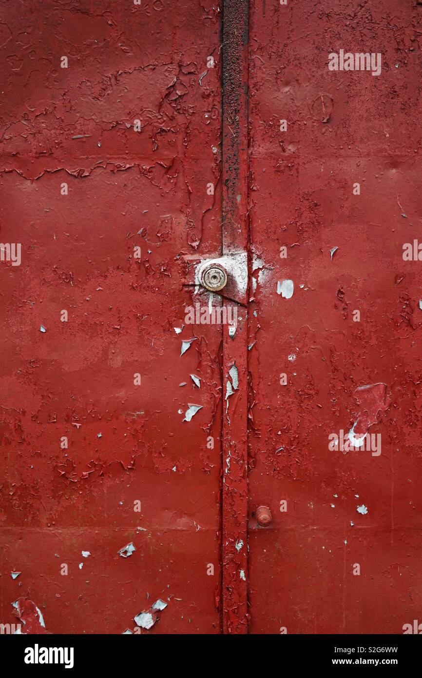 metallic red door texture pattern Stock Photo - Alamy