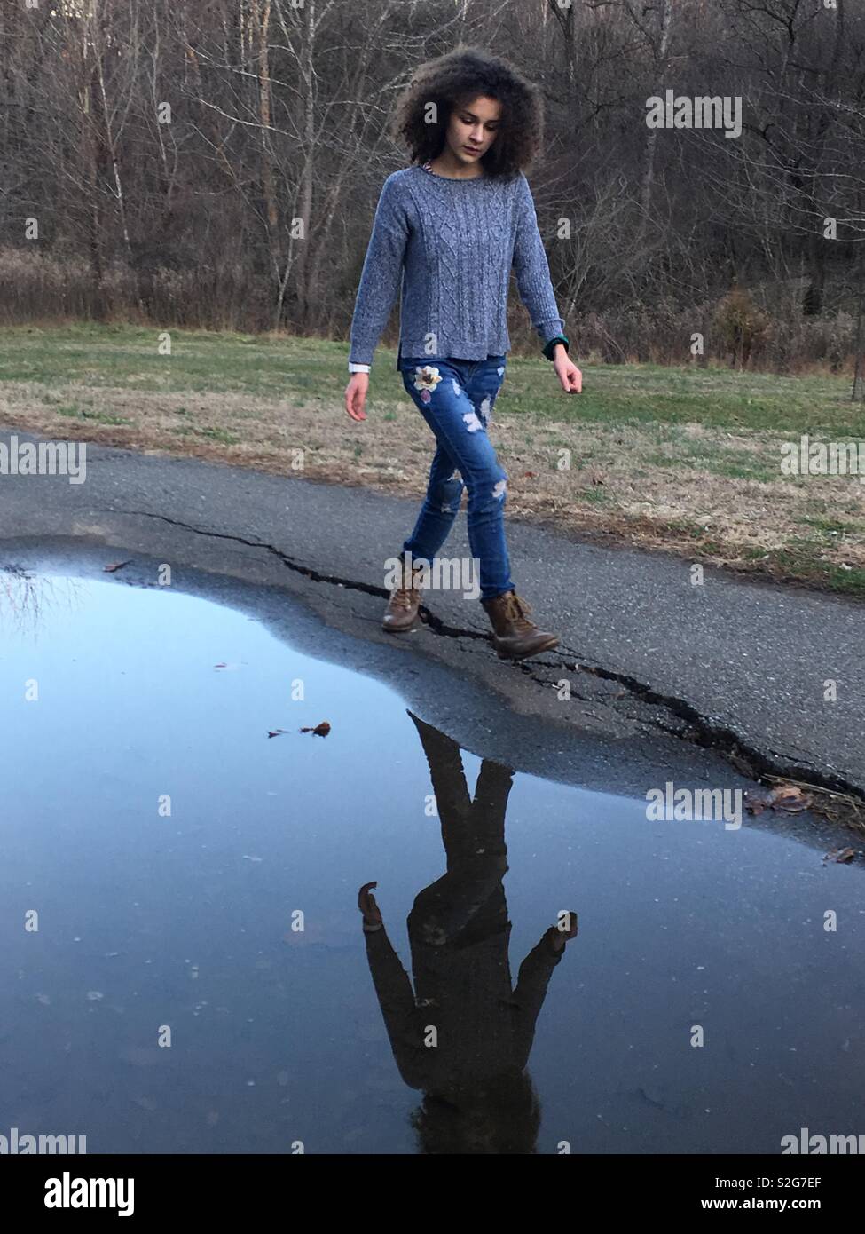 Teenager puddle hi-res stock photography and images - Alamy