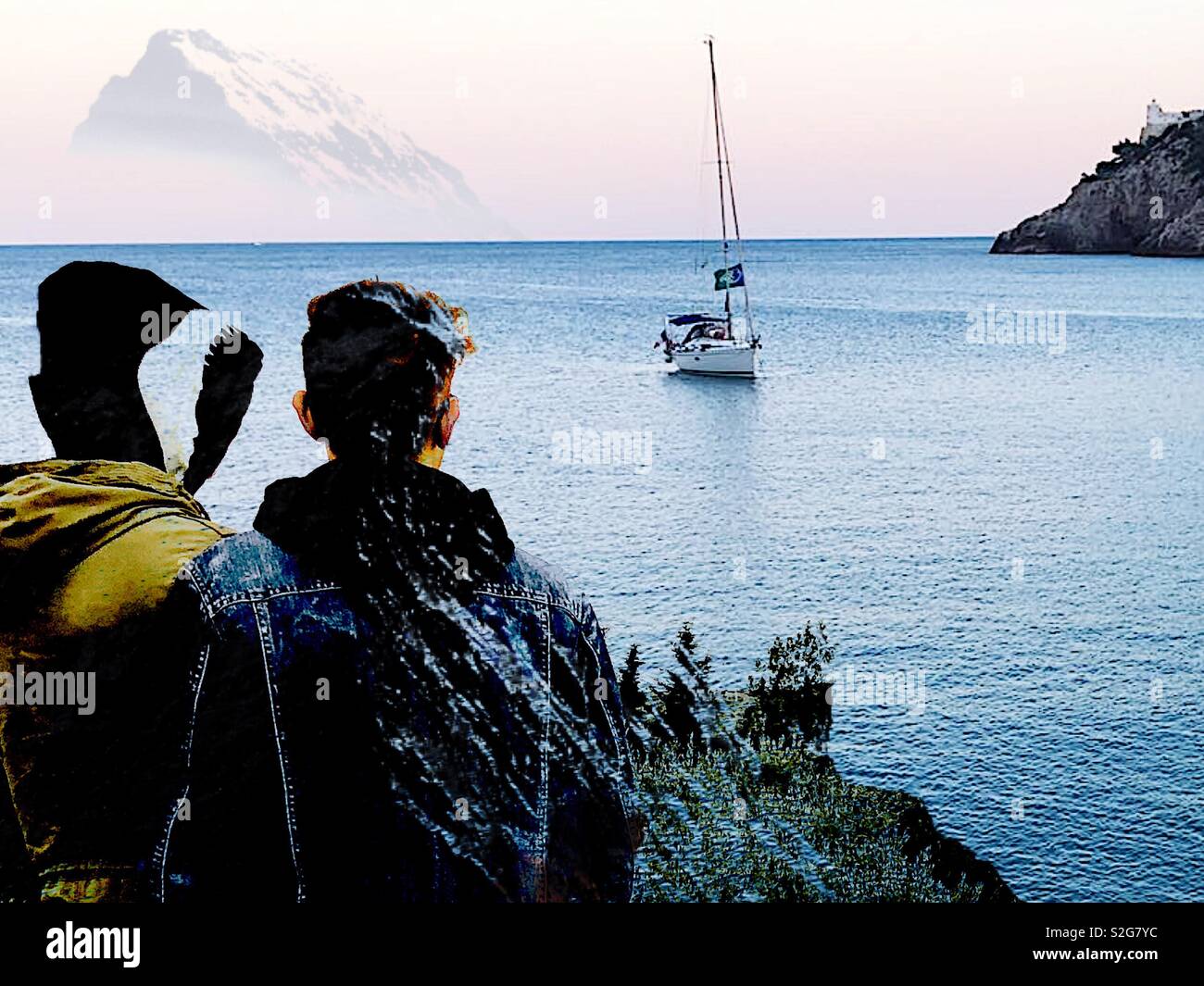 Two people looking this breathtaking view from above Stock Photo - Alamy