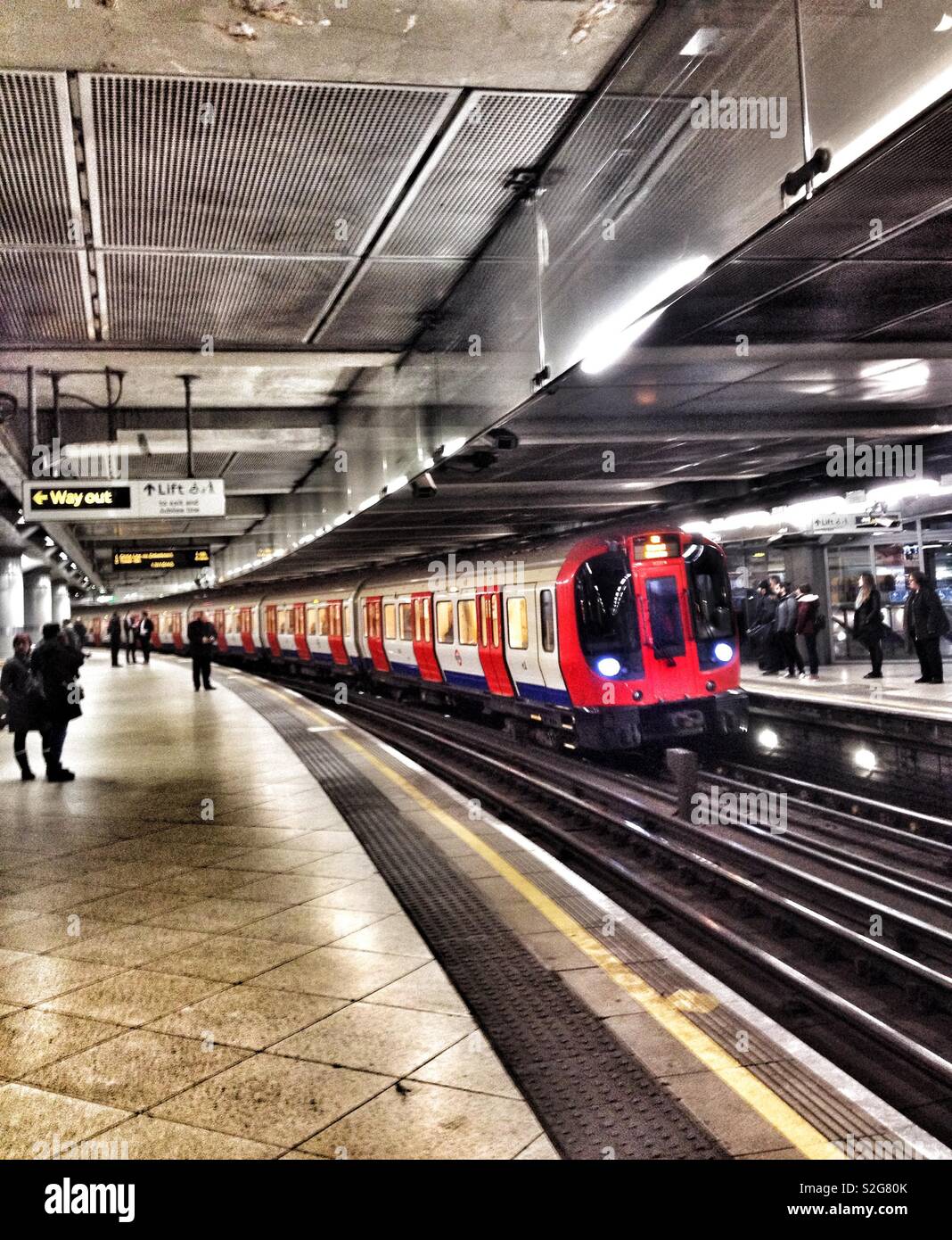 Underground train pulling station hi-res stock photography and images ...