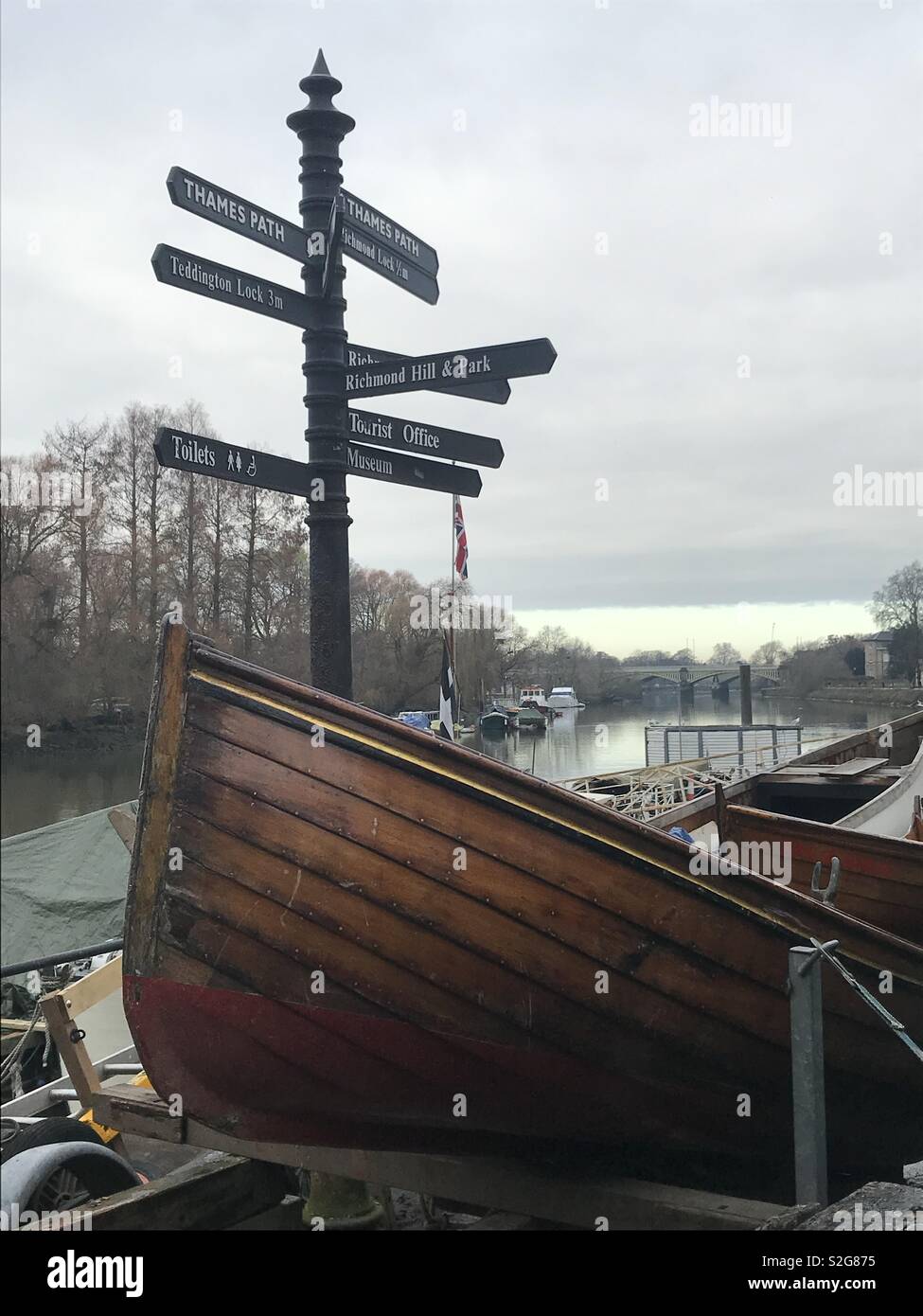 London boat & sign Stock Photo - Alamy