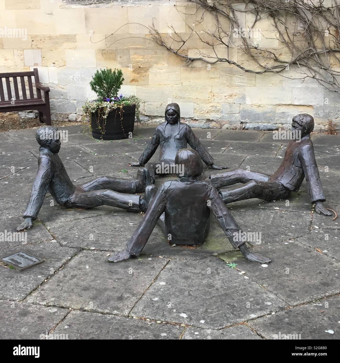 Statues sitting on the floor Stock Photo - Alamy
