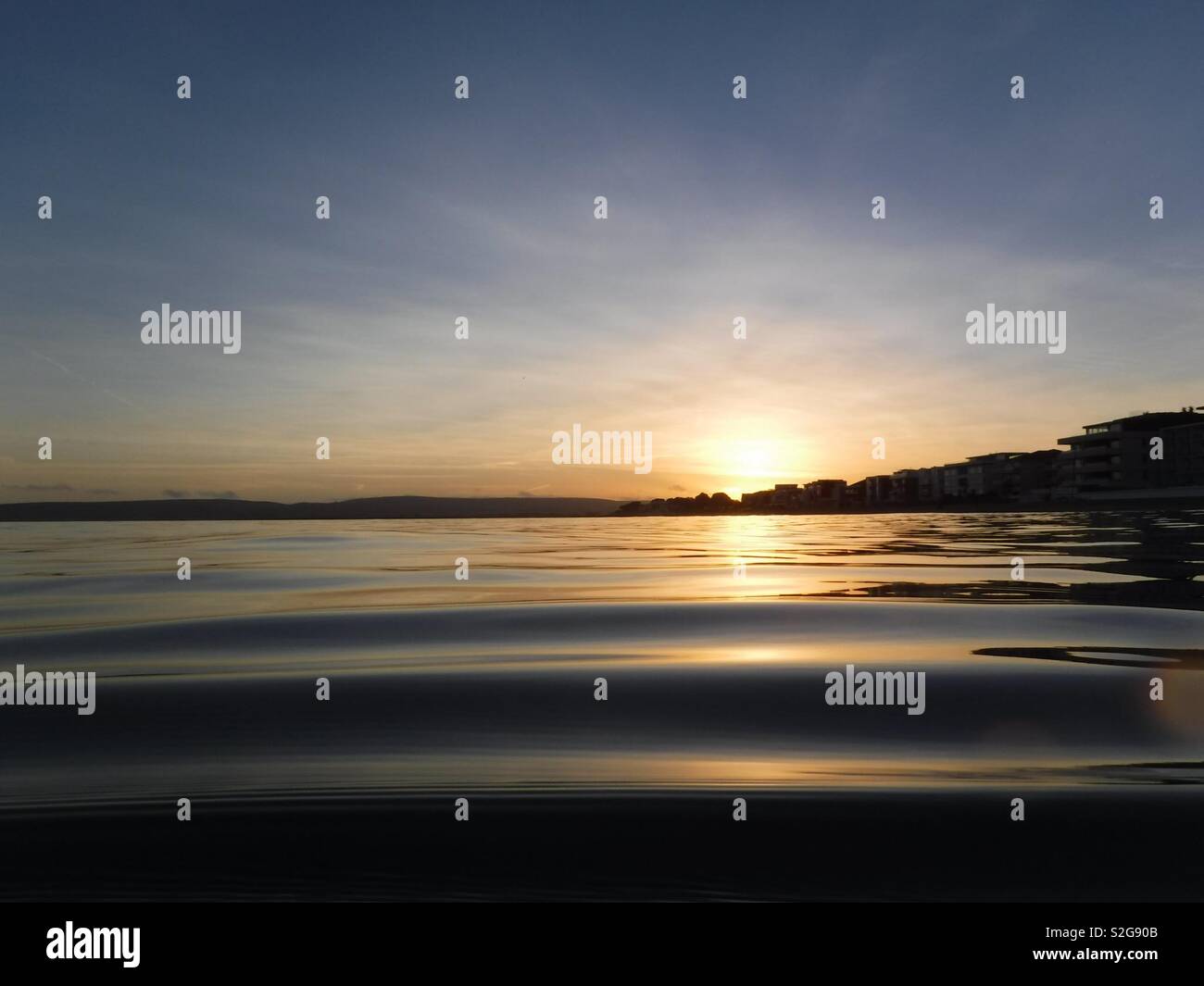 The swimming sunset hi-res stock photography and images - Alamy
