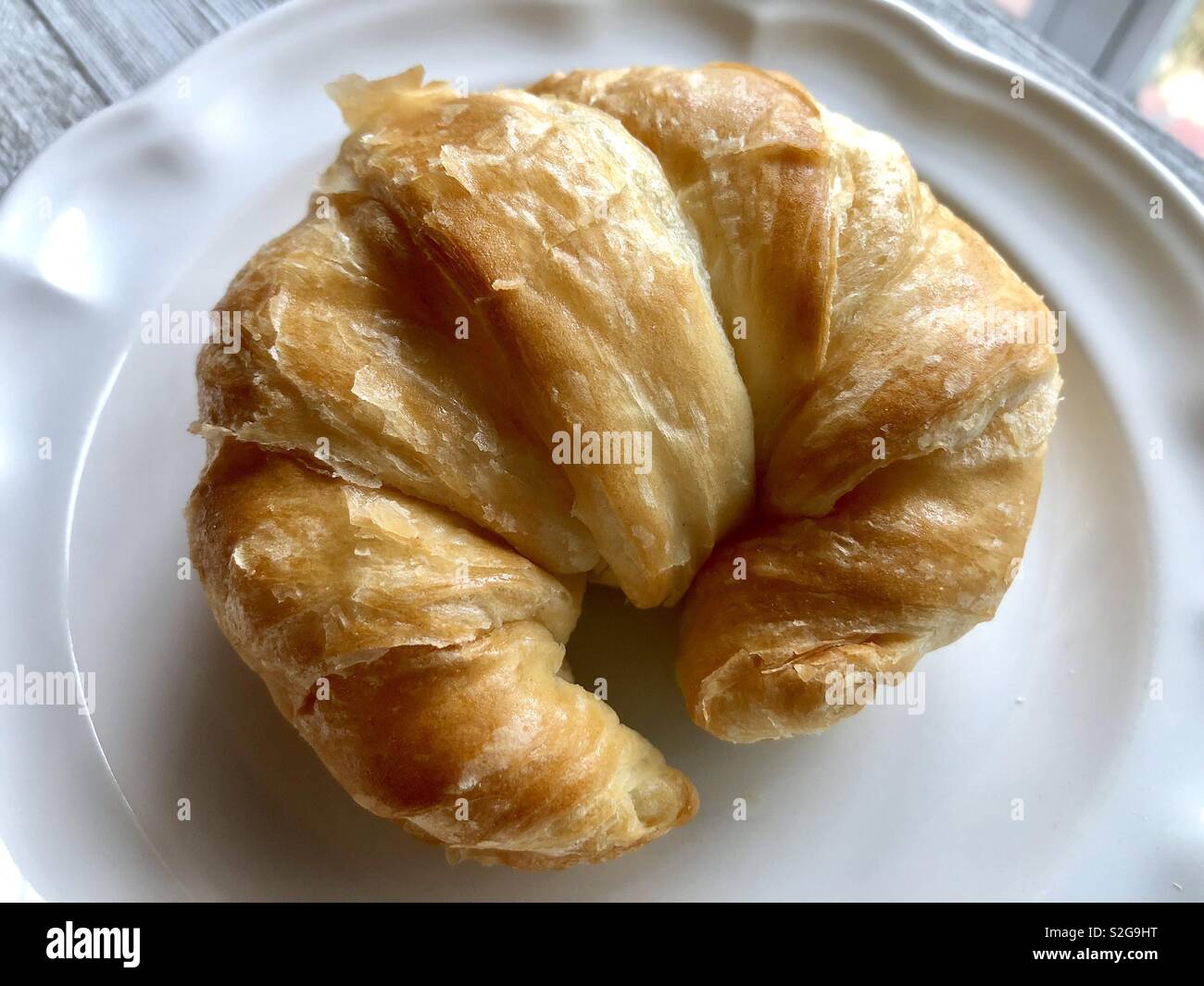 Croissant butter on plate hi-res stock photography and images - Alamy