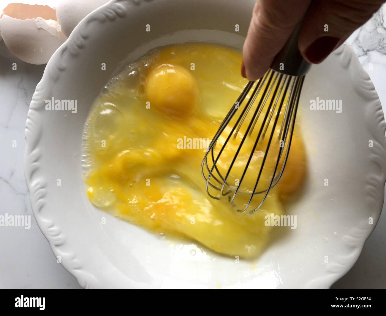 Mixing whisking hi-res stock photography and images - Alamy