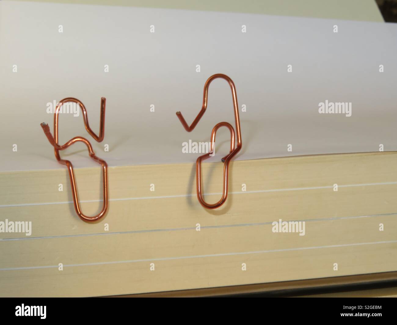Paper clips talking Stock Photo - Alamy