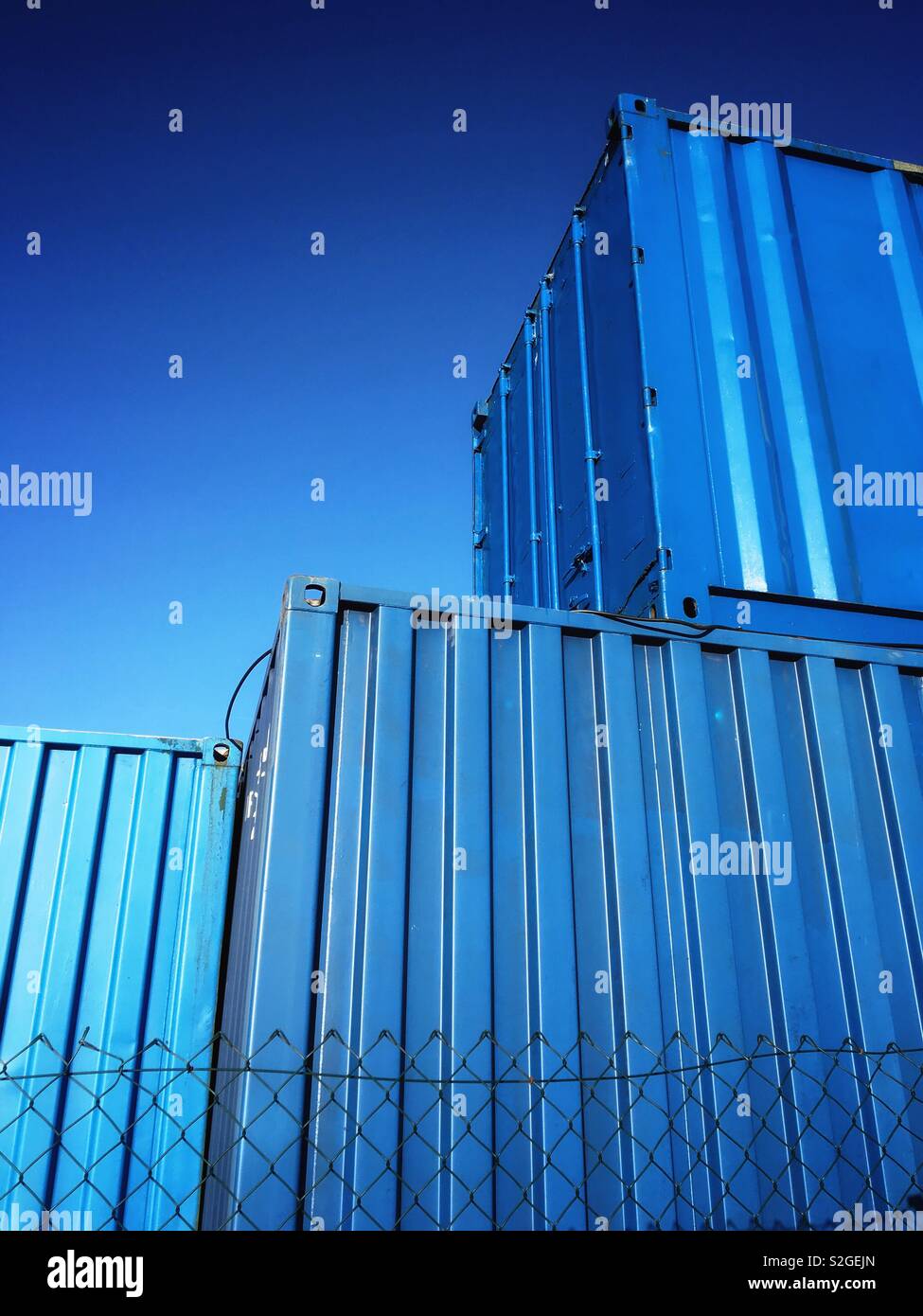 Blue shipping containers hi-res stock photography and images - Alamy